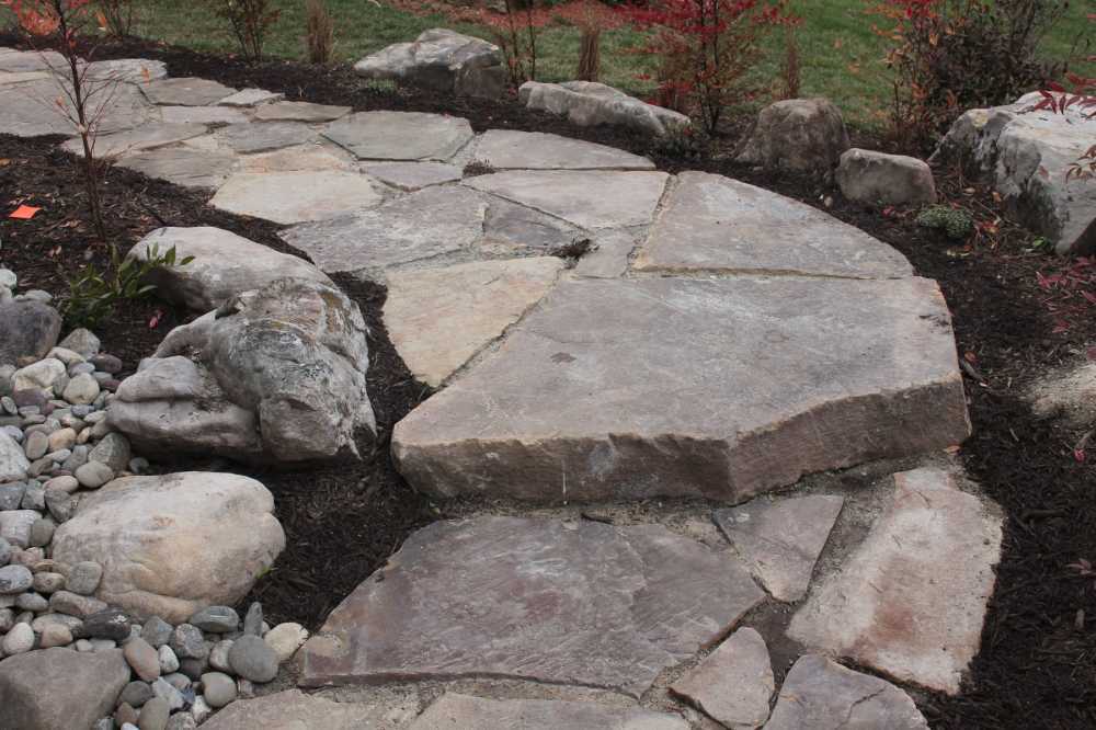 These thick stones were selected to make both walkway and steps in this ...
